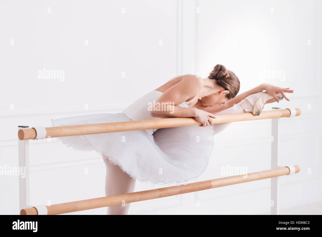 Side view of ballerina during ballet training Stock Photo - Alamy