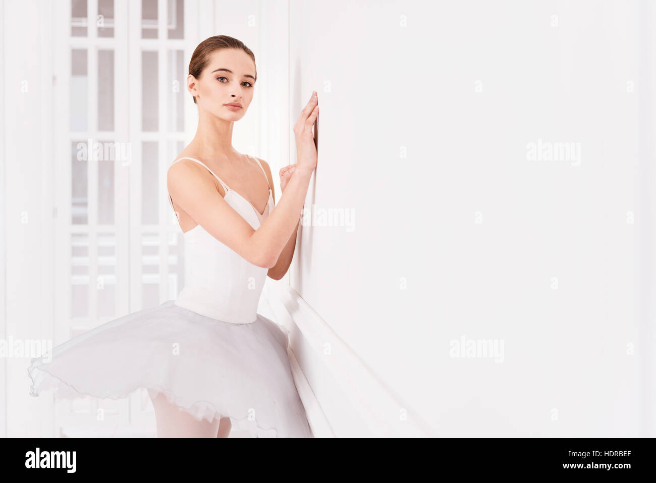 Beautiful ballet dancer looking at camera Stock Photo - Alamy