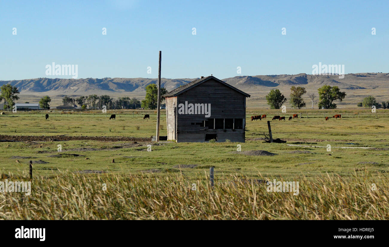 Ranch land in western Nebraska with old cabin in foregrand and the ...