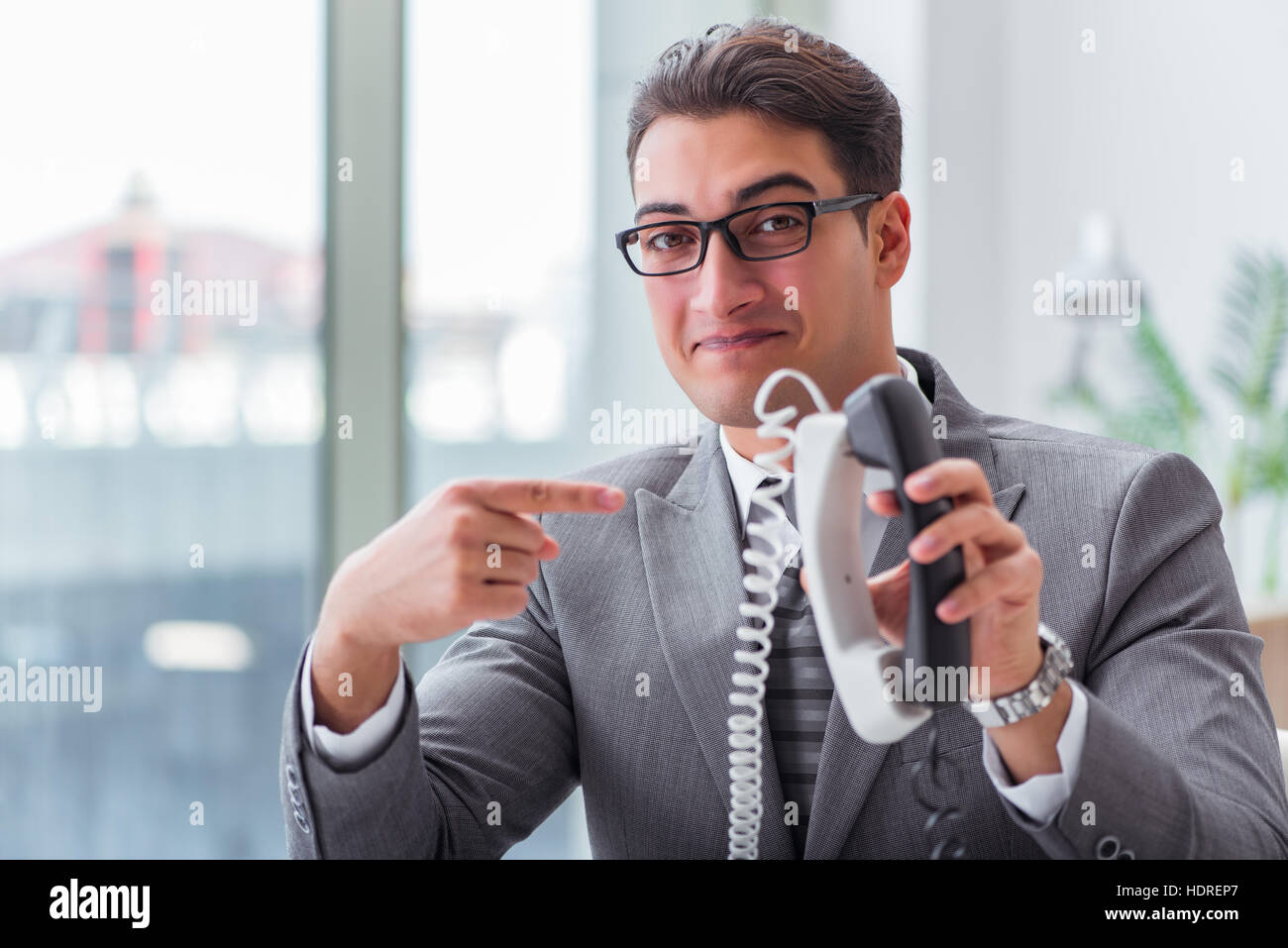 Angry helpdesk operator in hi-res stock photography and images - Alamy