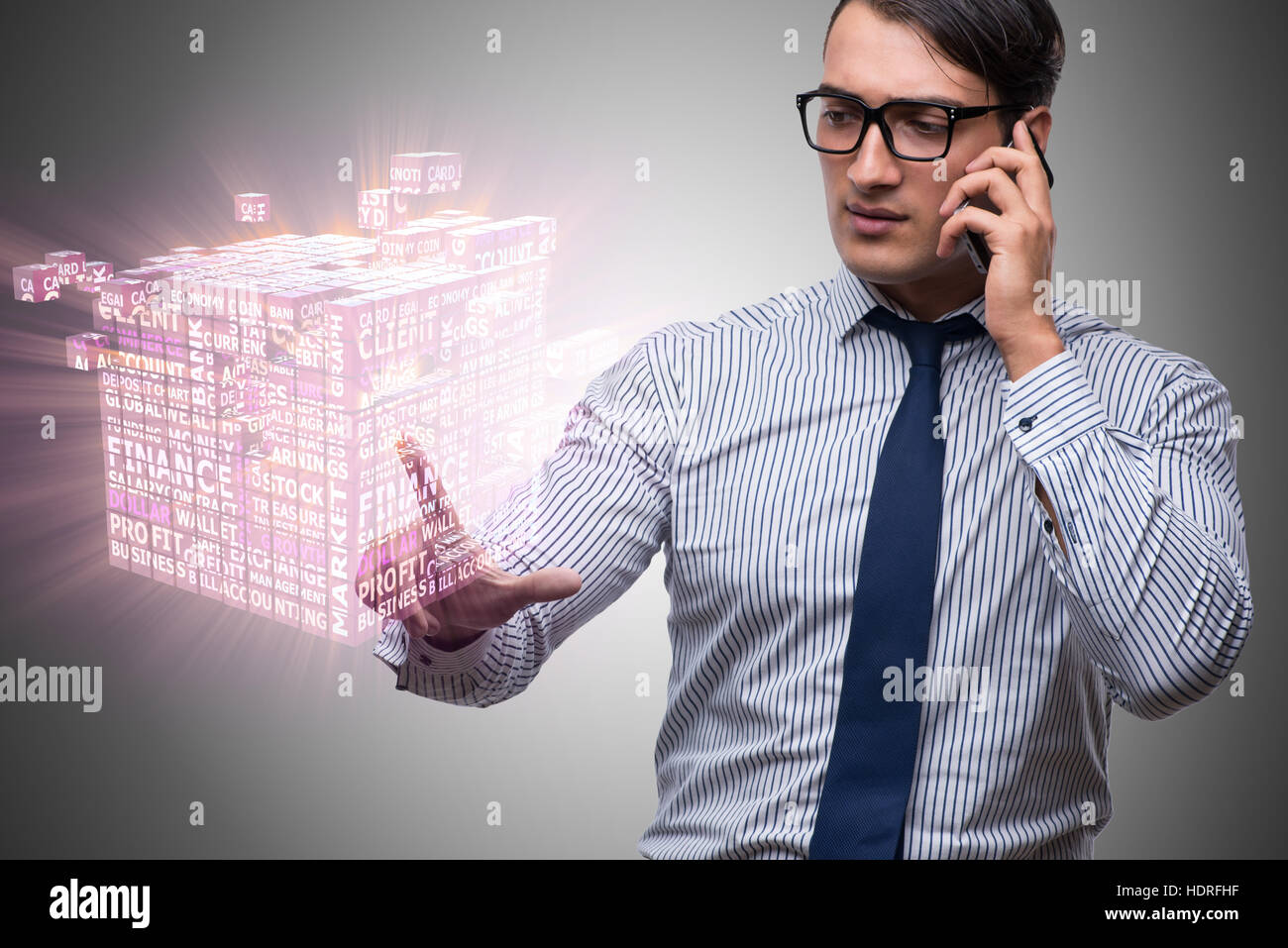 Businessman with mobile phone pressing buttons Stock Photo - Alamy