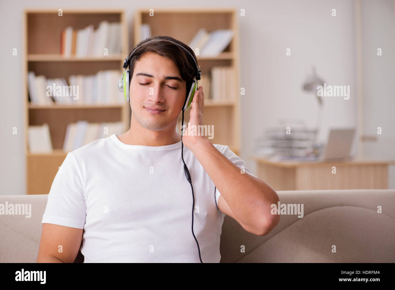 Handsome man listening to the music Stock Photo - Alamy