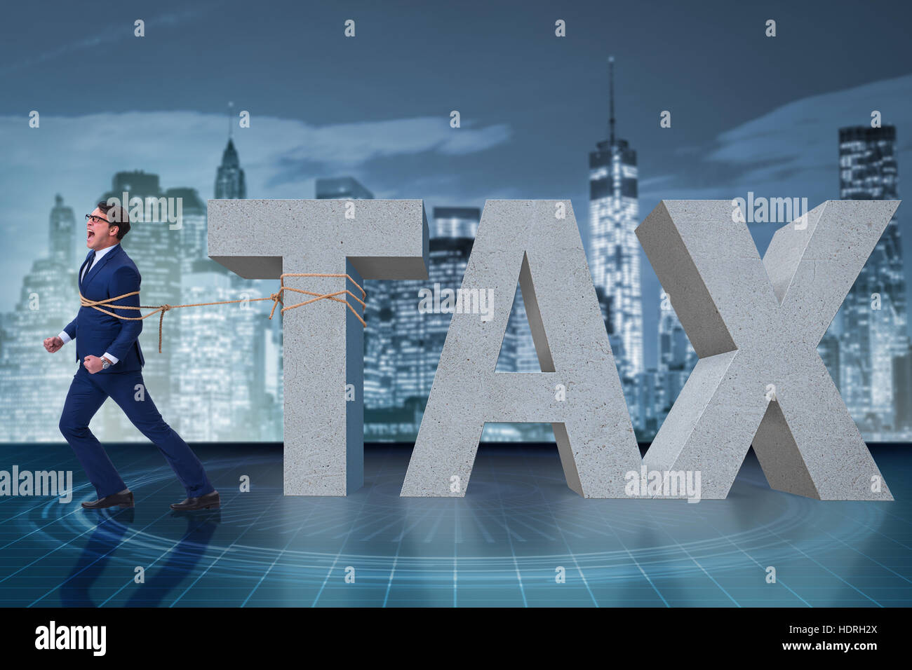 Businessman suffering from high taxes Stock Photo - Alamy