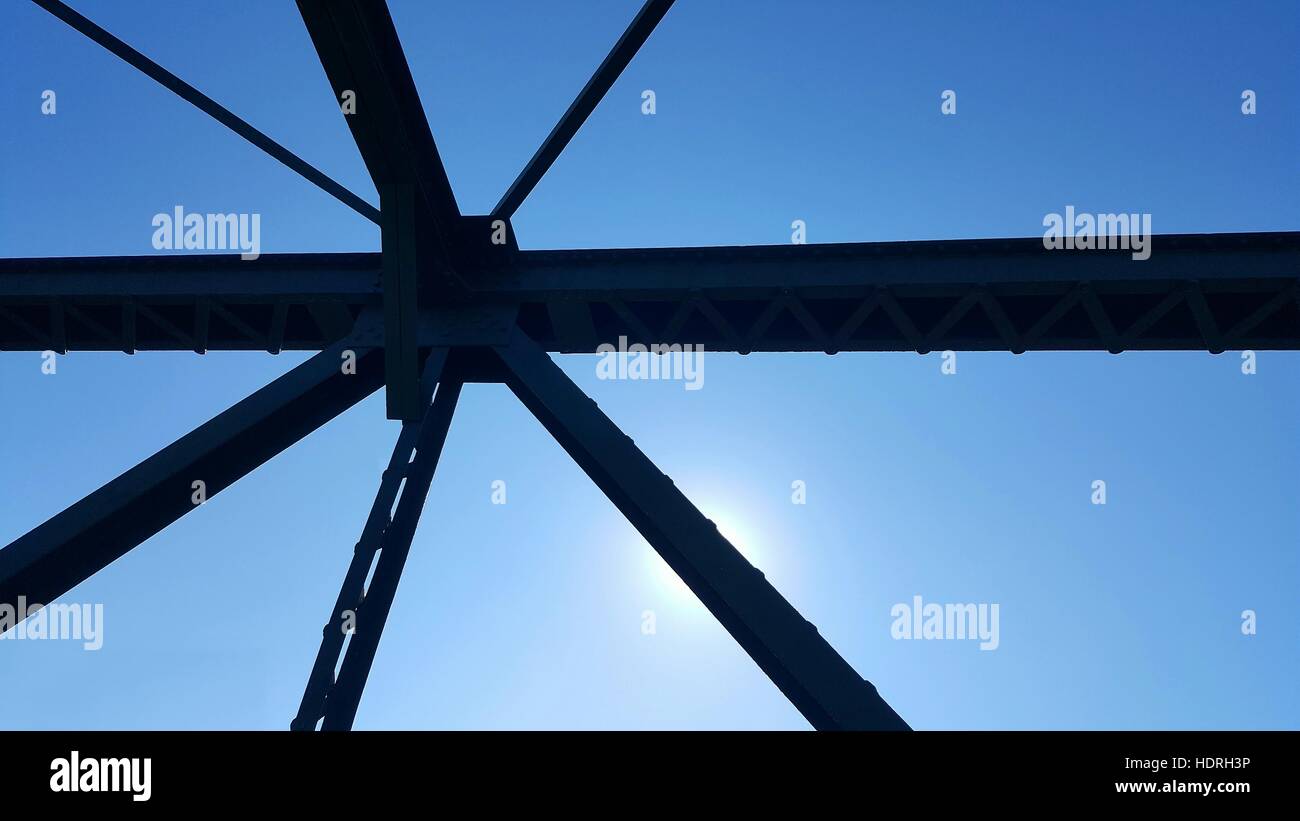 Steel structure support above the bridge on blue sky background Stock ...