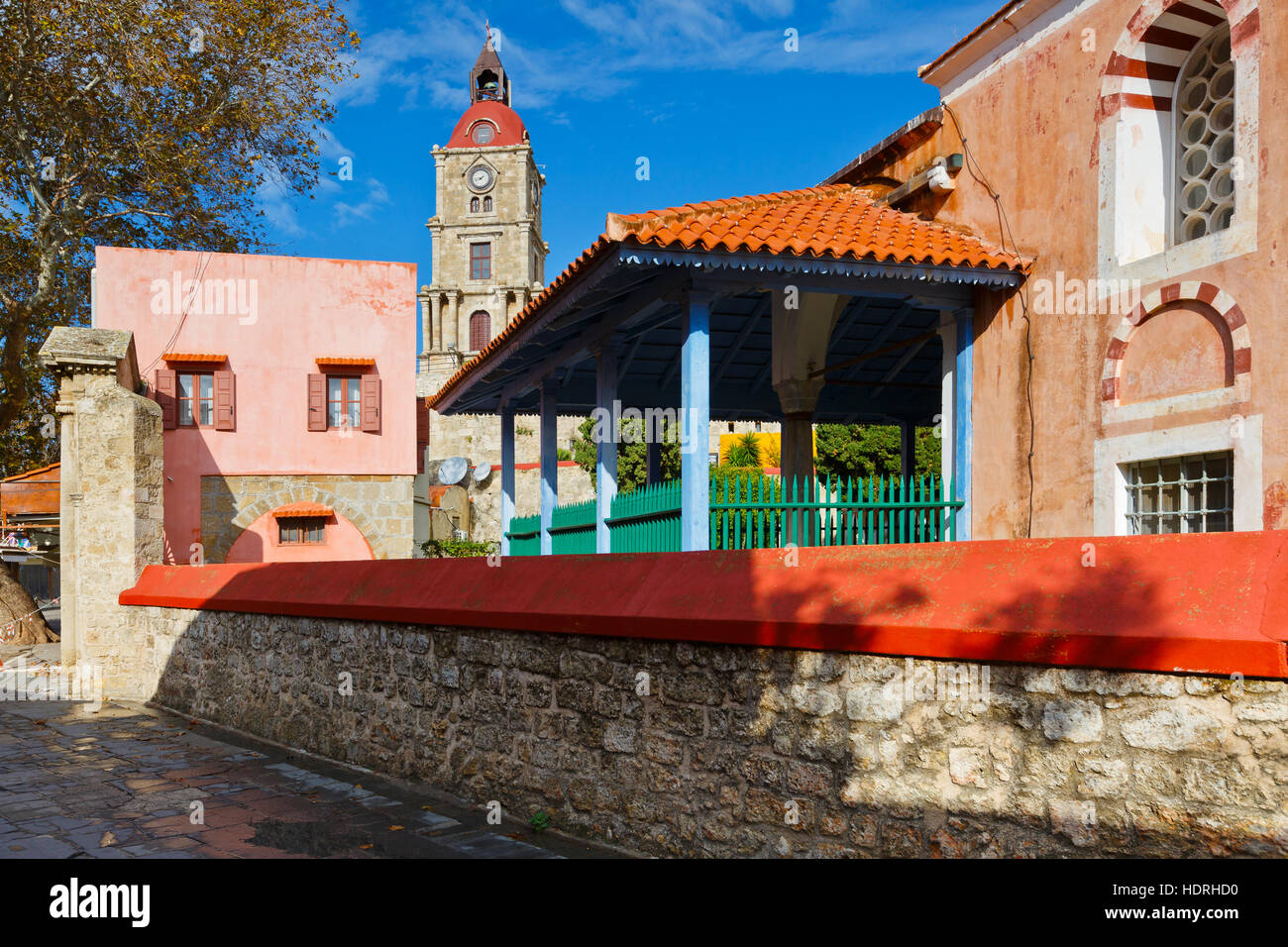 Roloi clock tower and a mosque in the historic town of Rhodes Stock ...