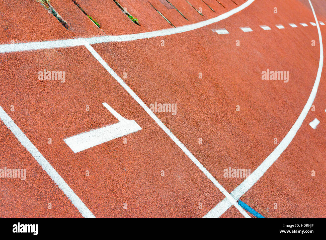 lane No.1 of rubber runway with curved lines Stock Photo - Alamy