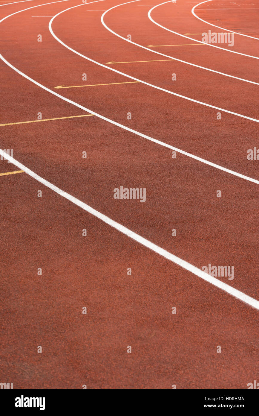 rubber runway with curved lines Stock Photo - Alamy