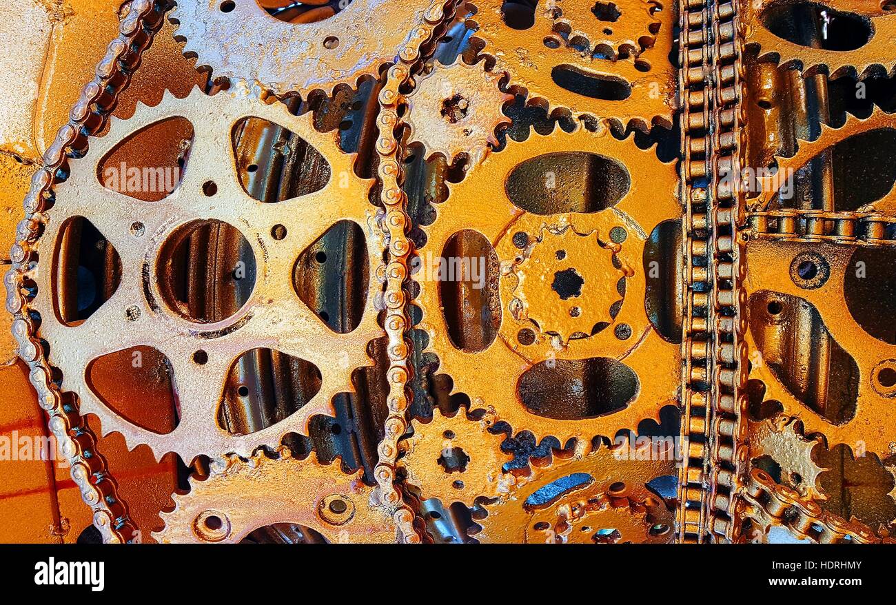 Yellow painted automobile engine part Stock Photo - Alamy