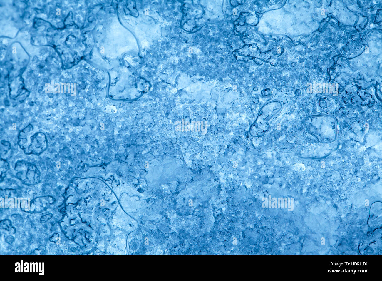 Block of blue smooth melting ice, close-up Stock Photo - Alamy