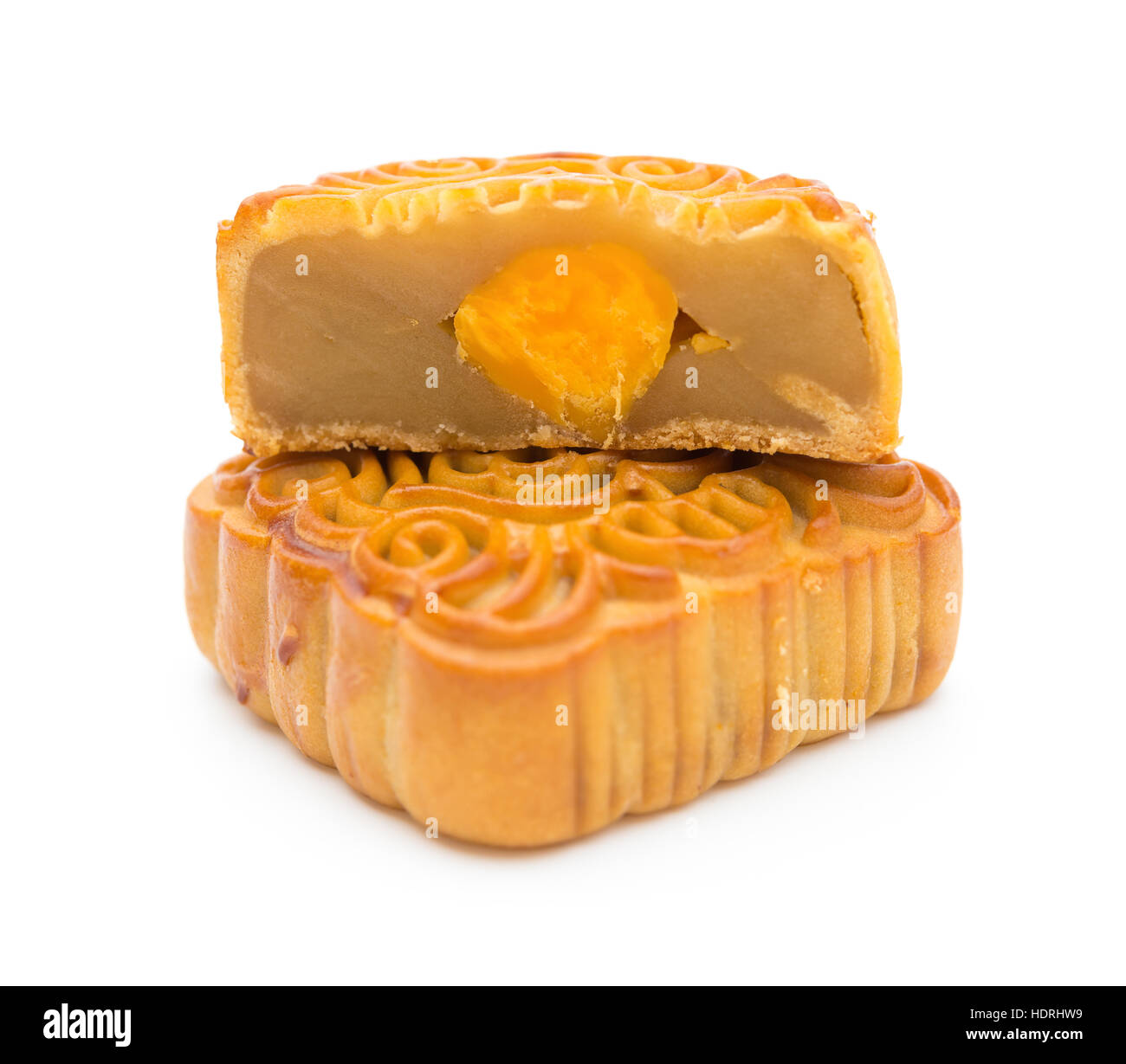 two chinese mooncake with one cut out to celebrate the Middle Autumn ...