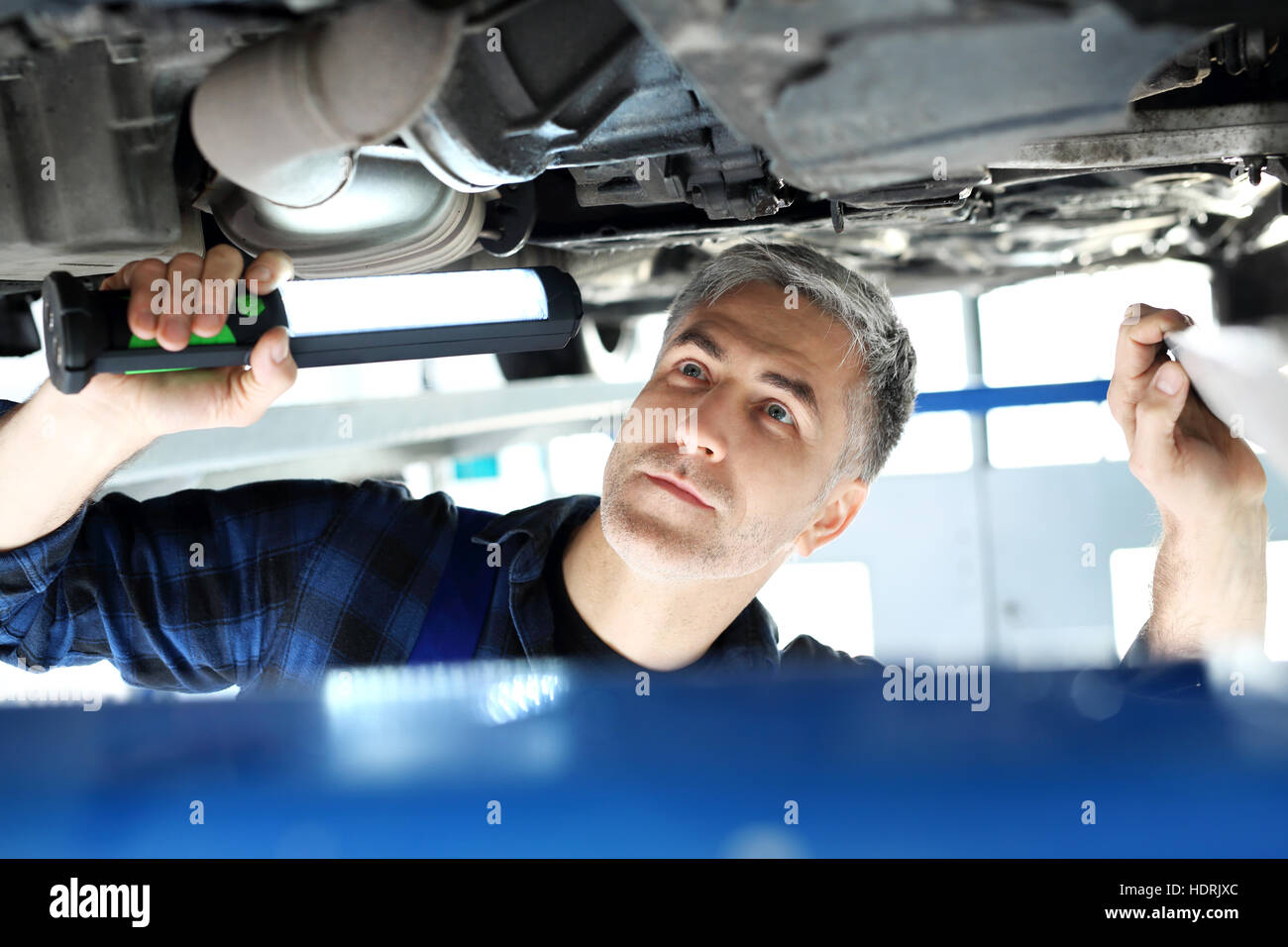 Man repairing a car hi-res stock photography and images - Alamy
