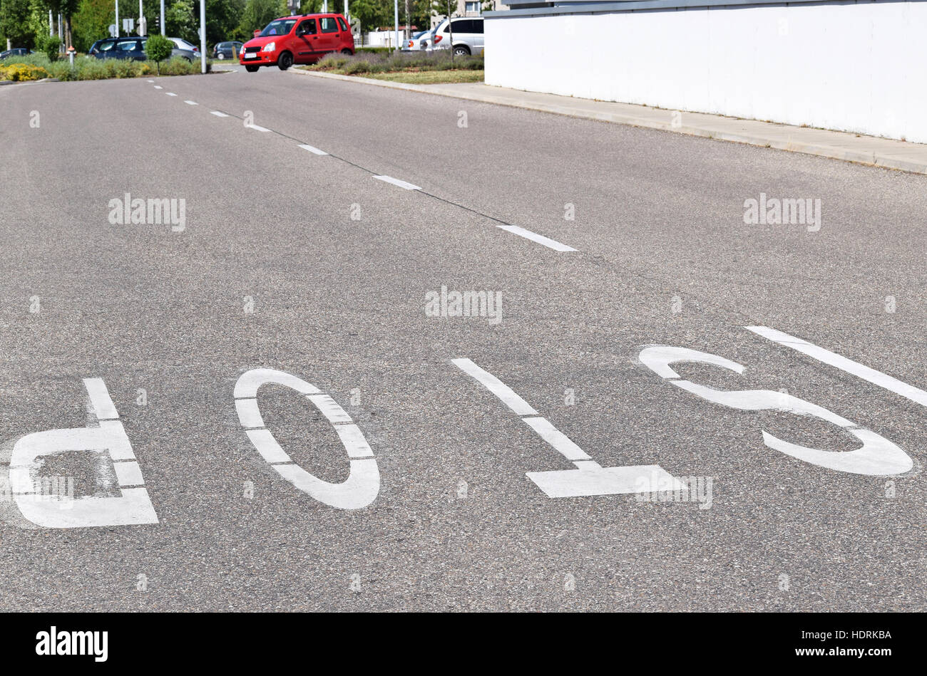 Stop sign on the road Stock Photo - Alamy