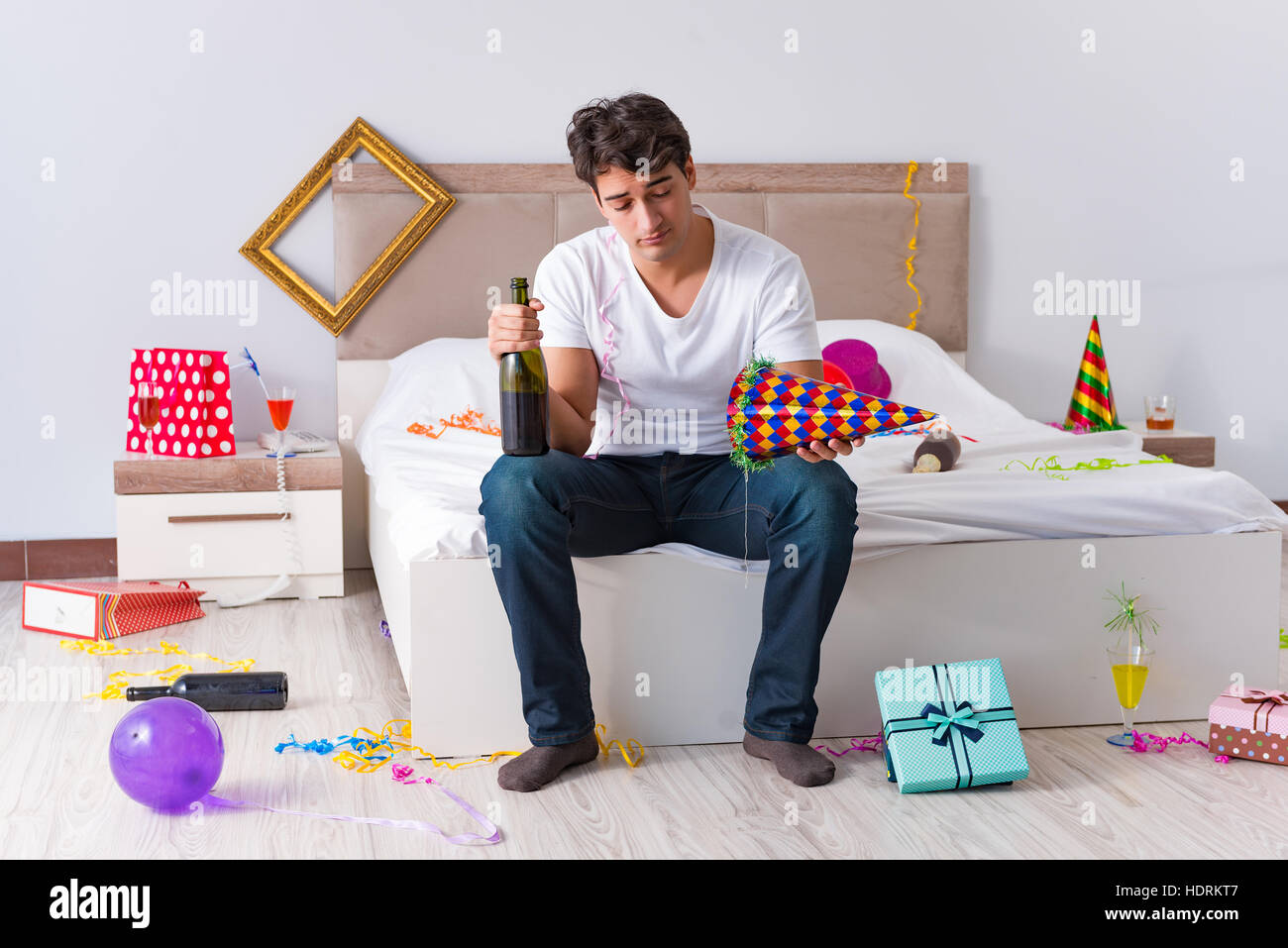 Man after heavy christmas partying at home Stock Photo - Alamy