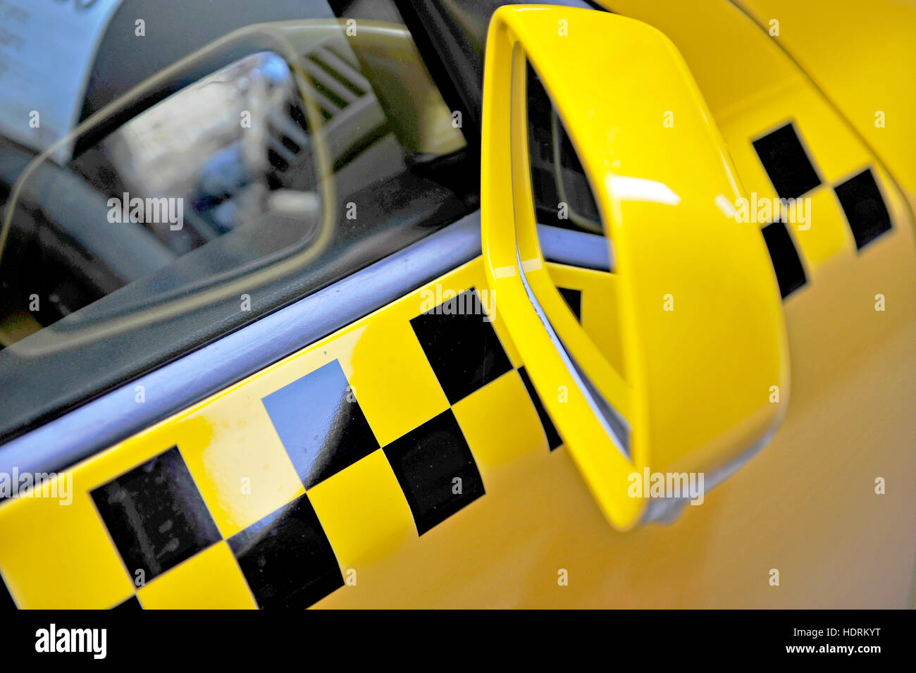 Taxi car mirror reflection in the window Stock Photo - Alamy