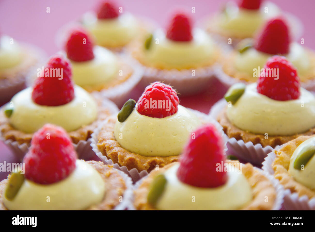 Homemade round tartlets with fresh raspberry Stock Photo - Alamy