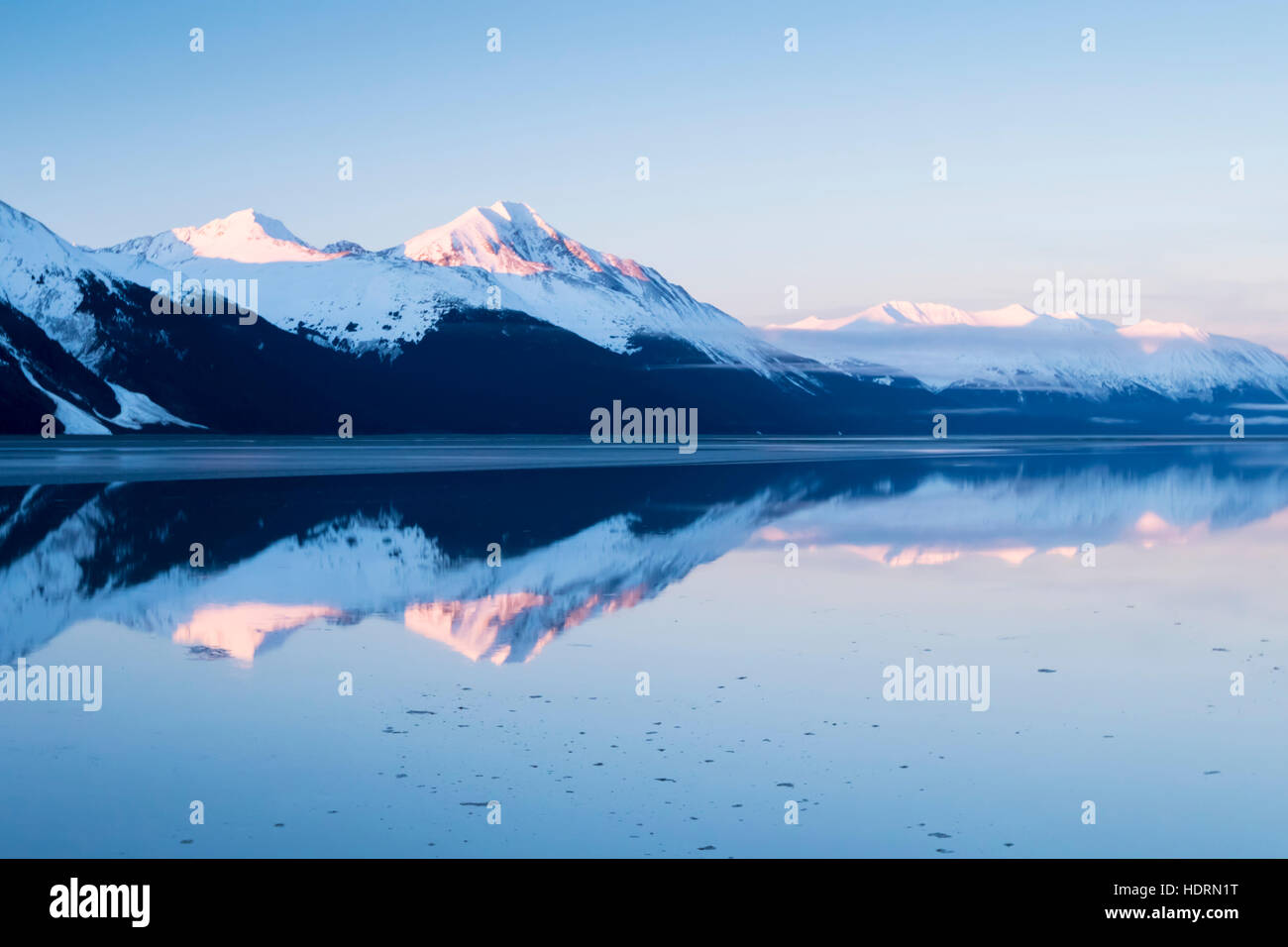 Snow covered mountains across Turnagain Arm in springtime, near Mile 87 ...