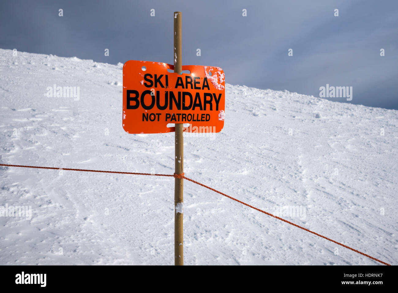 Orange sign for ski area boundary, Sunshine ski resort, Banff National ...