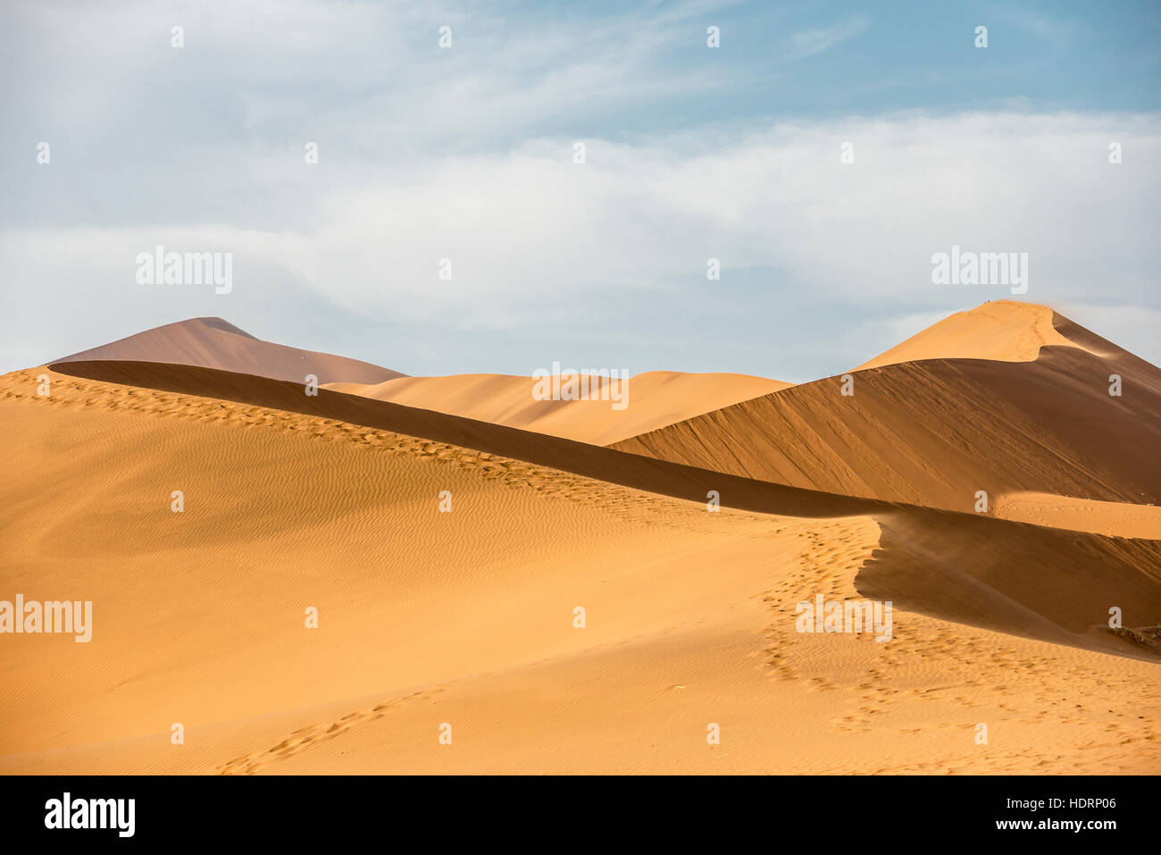 Endless sand waves and human foot traces on a sand dune of Namib Desert ...