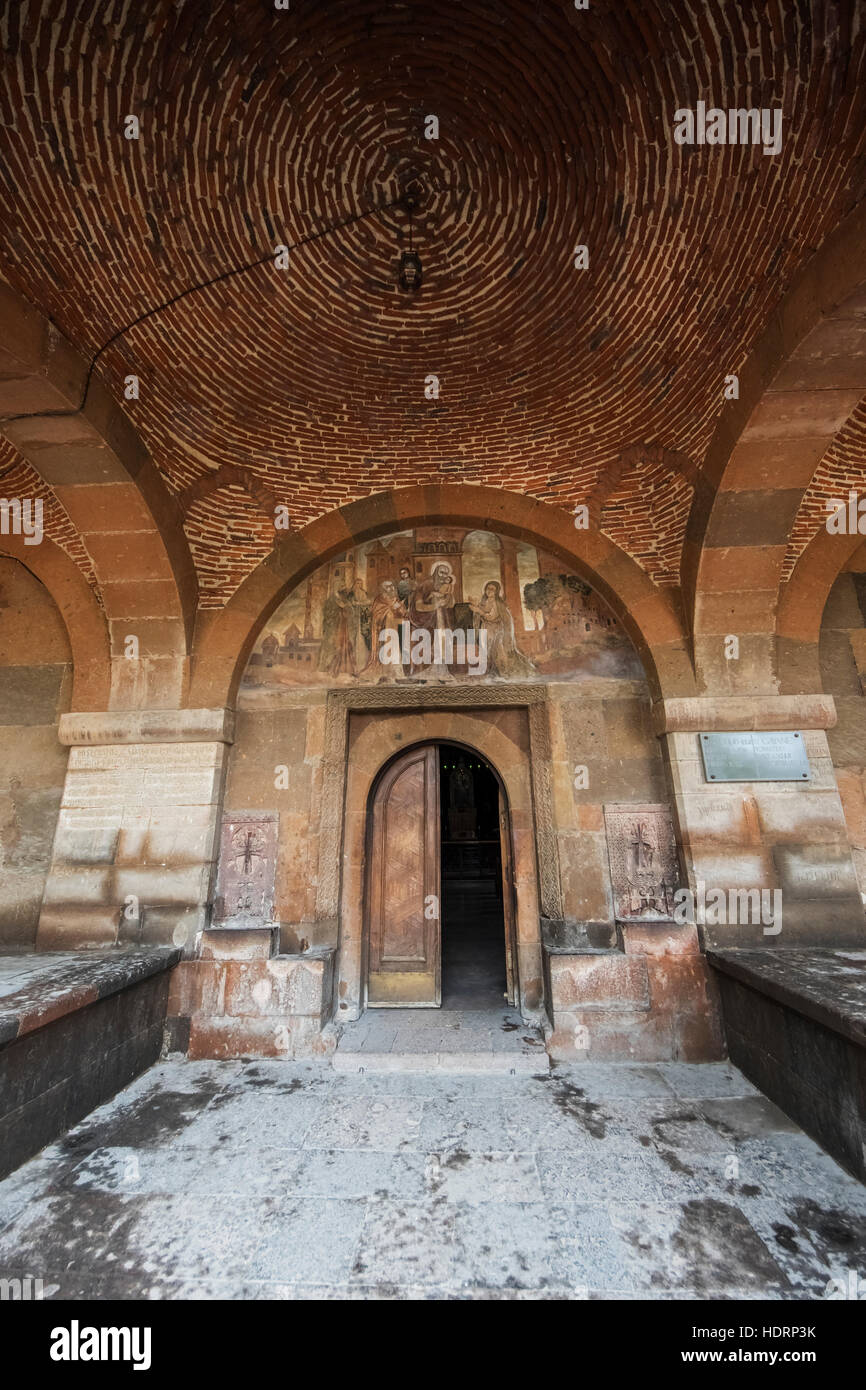 Frescoes depicting saints on the tympanum above the door to Saint ...