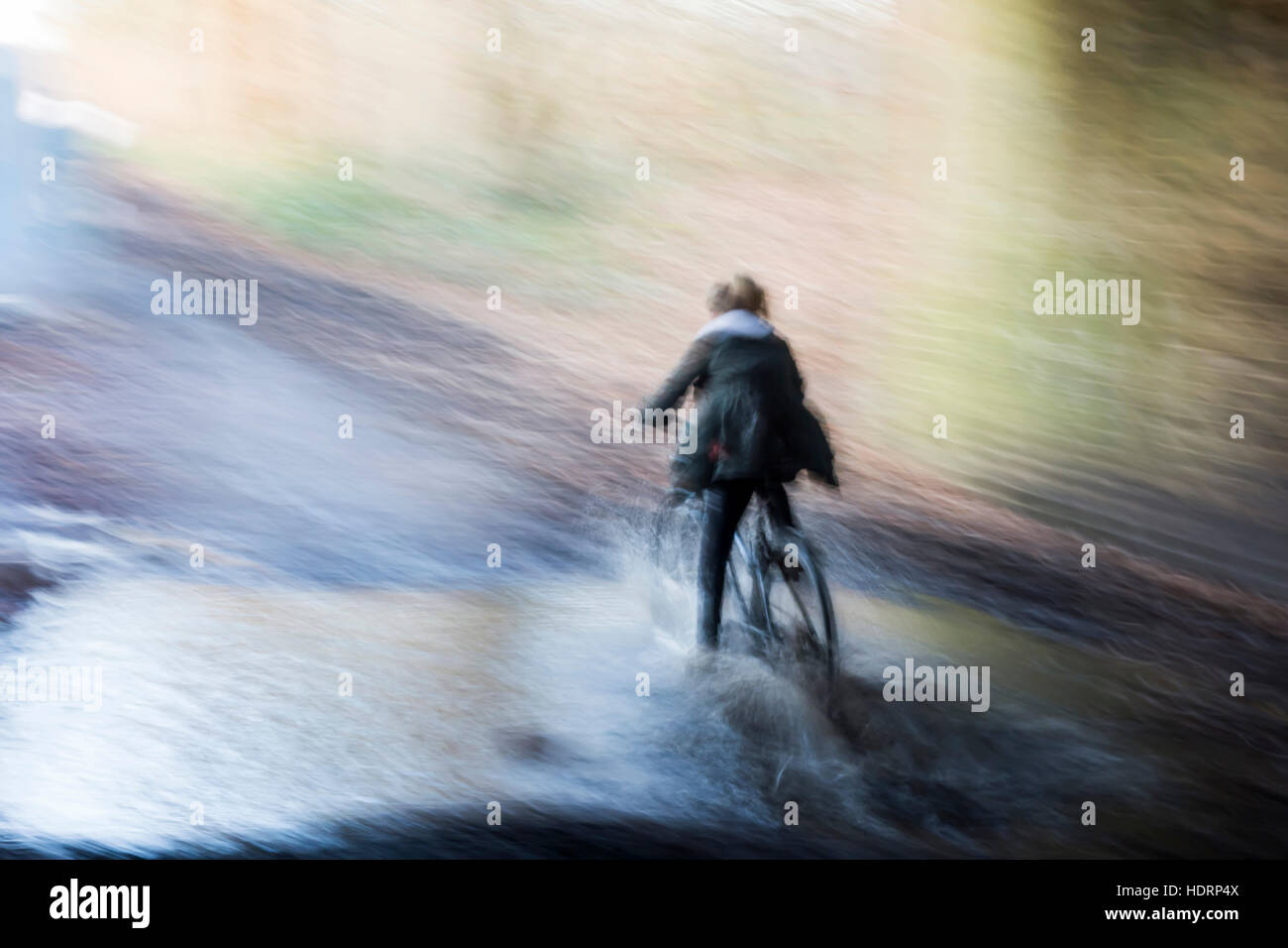 Cycling in flooded water hi-res stock photography and images - Alamy