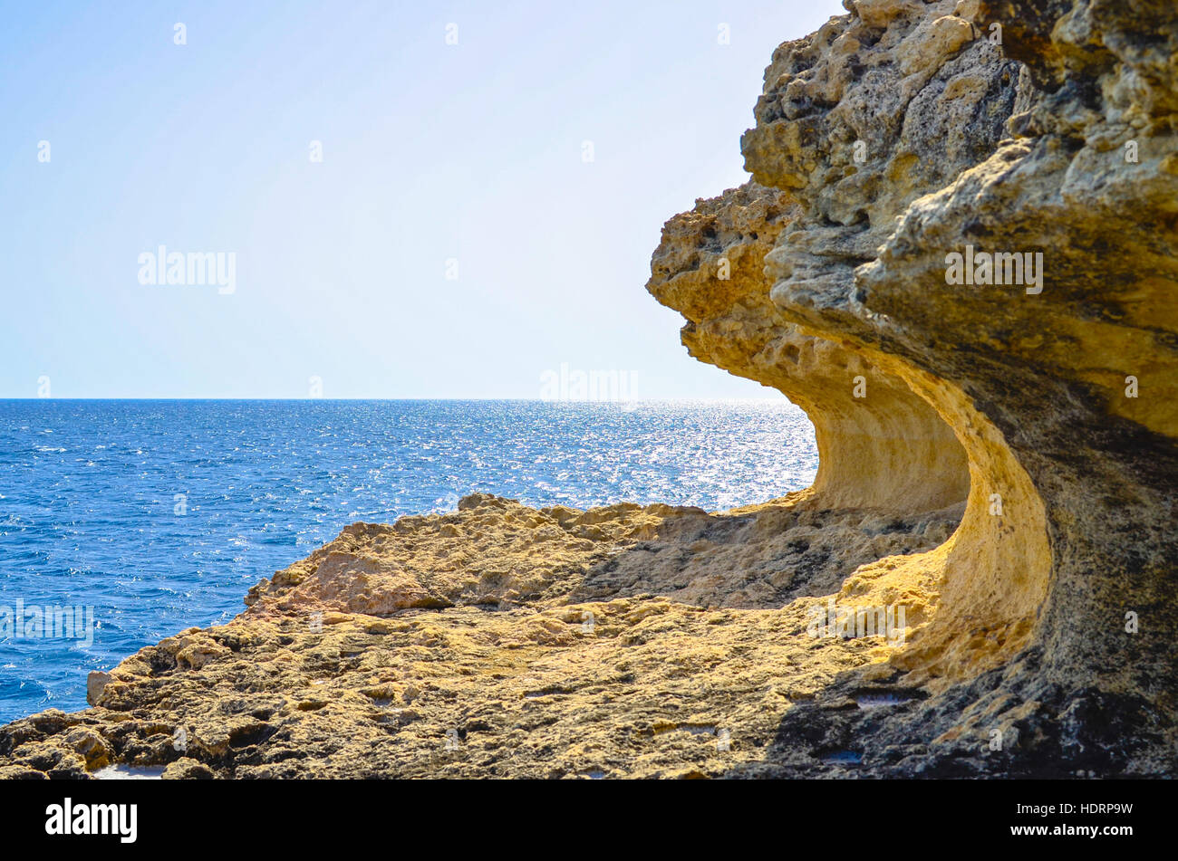 Curved rocks on the Mediterranean Sea in Malta Stock Photo - Alamy