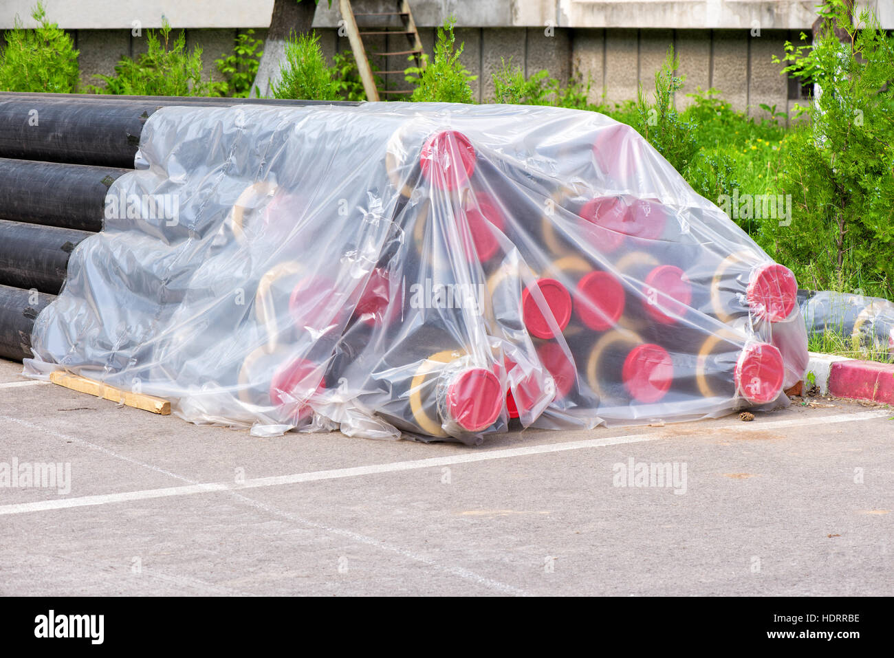 Pipes covered with plastic Stock Photo - Alamy