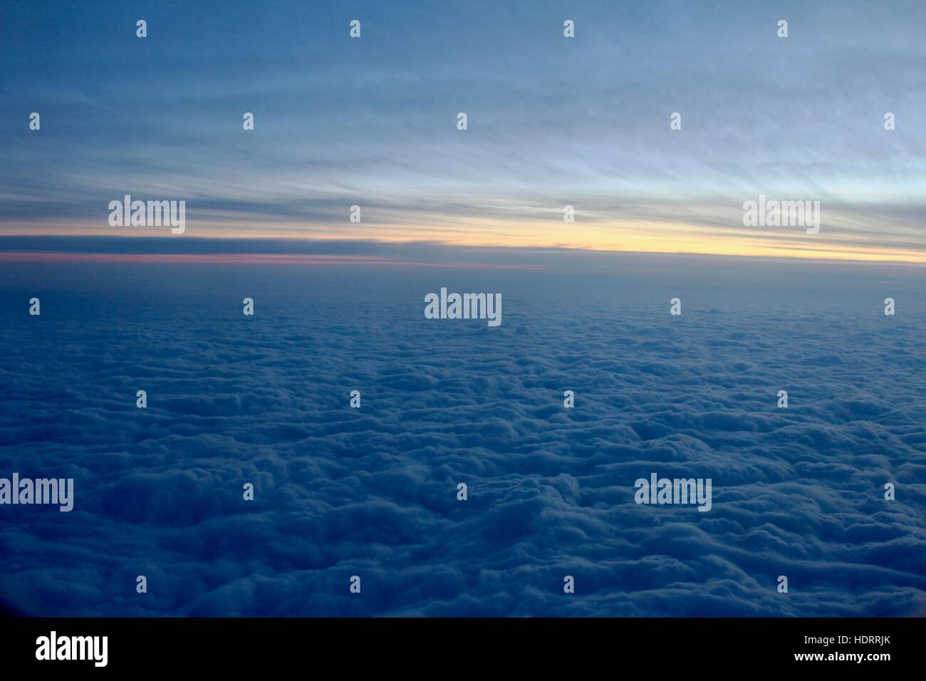 The view from outside the airplane window above clouds during winter ...