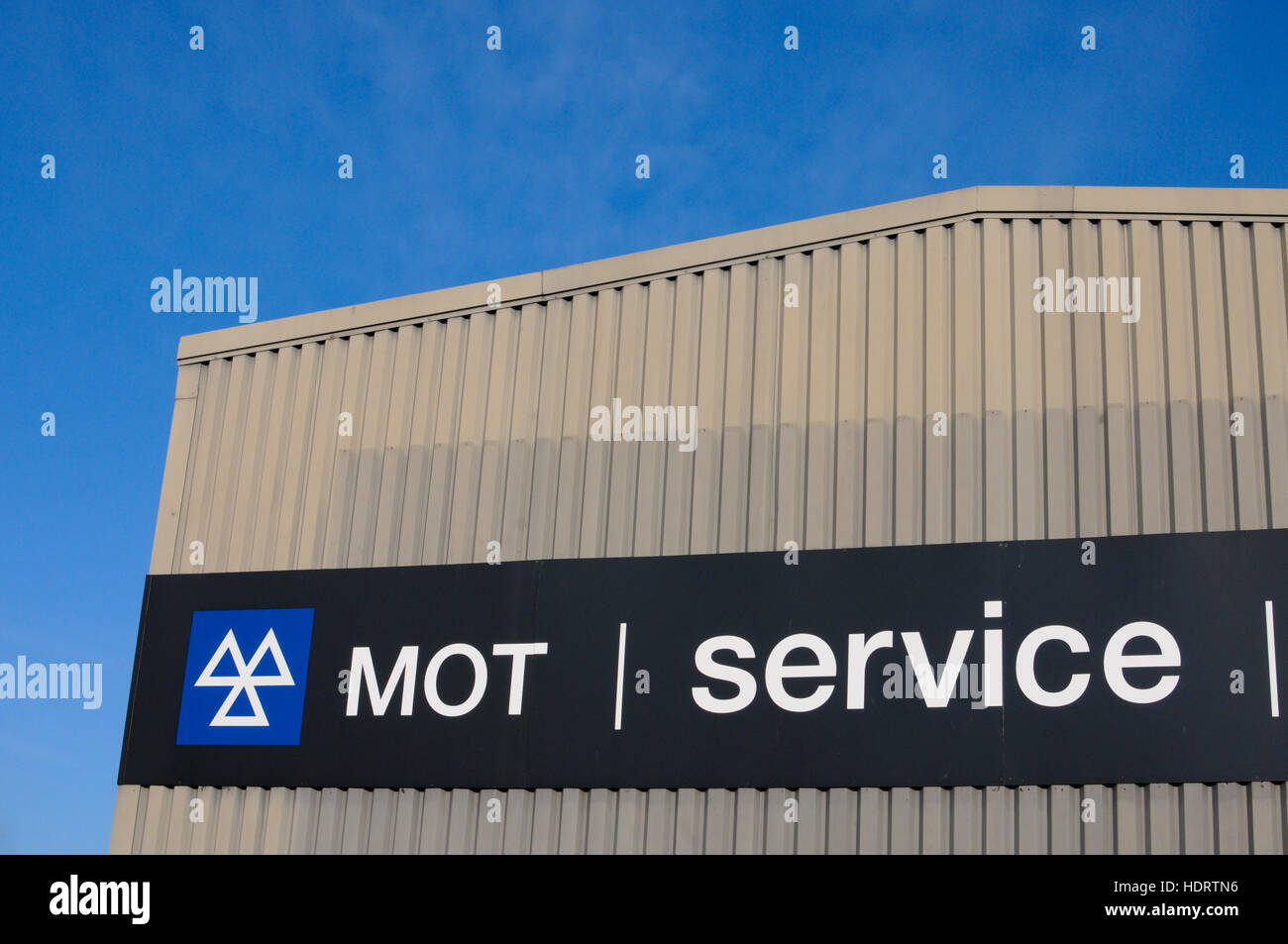 Halfords AutoCentre sign Stock Photo - Alamy