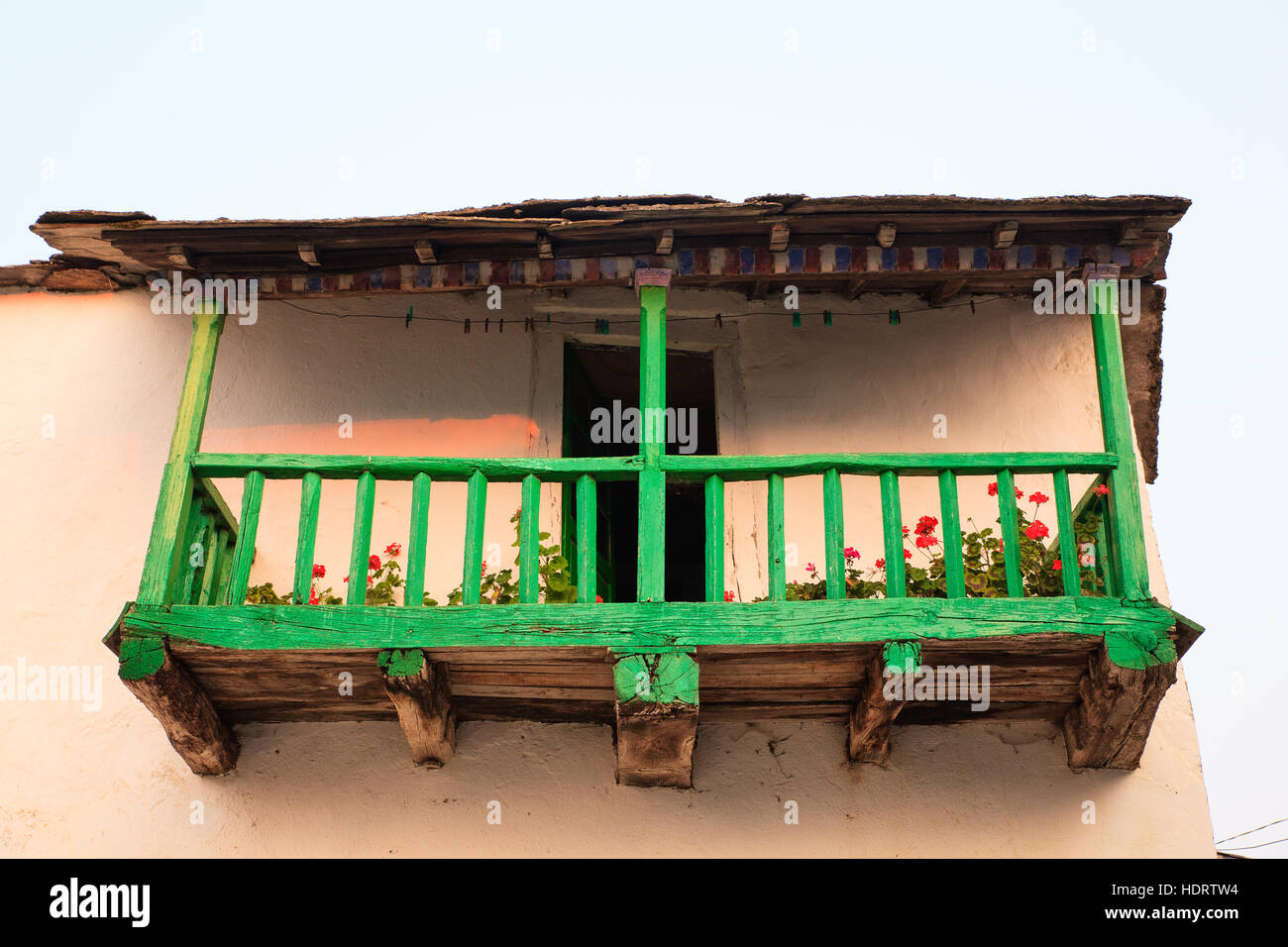 View of old green balcony of rural house Stock Photo - Alamy