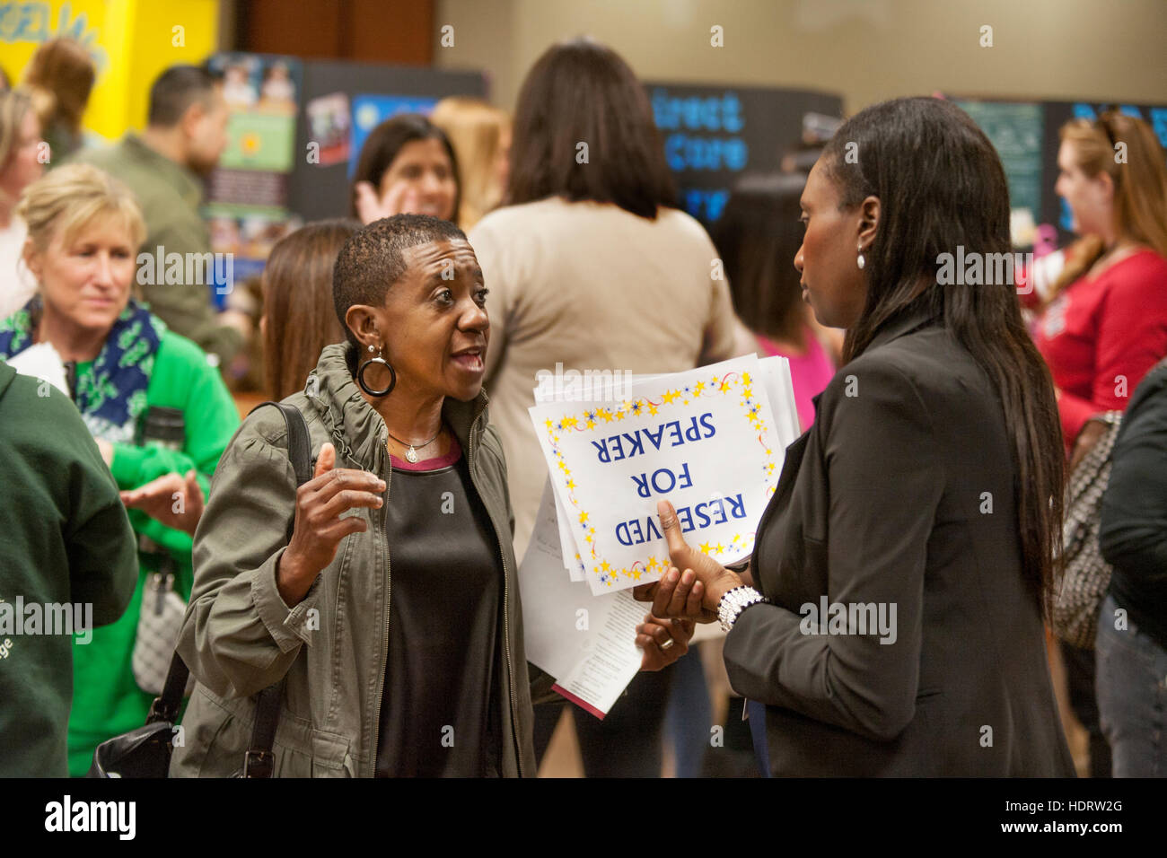 School counselors meet with local teachers in a community open house at ...
