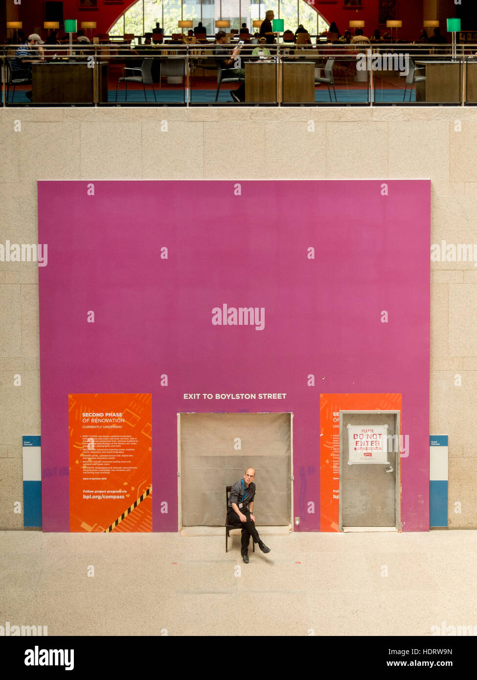A watchman guards a temporary door during renovations at the Boston ...
