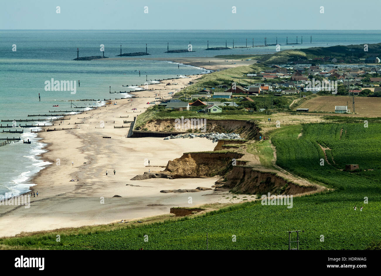 North Sea coast at Happisburgh, Norfolk UK, showing offshore reefs in ...