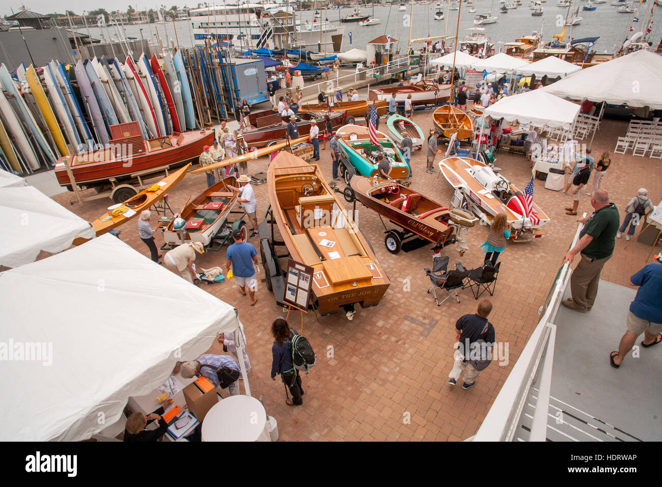 Classic wooden boats are on exhibit at a yacht club marina in Newport ...