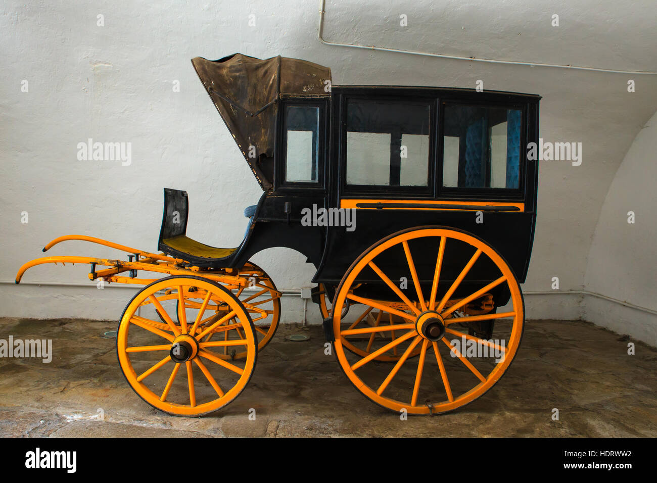 View of ancient black and yellow carriage Stock Photo - Alamy