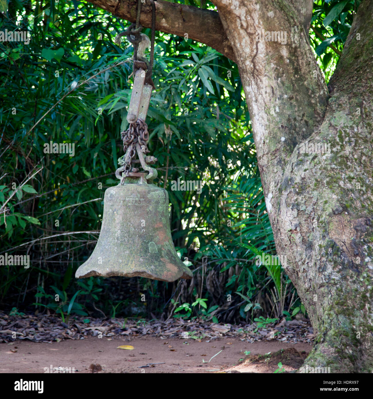 The church in Banana Island is in ruins, but the bell still can be ...