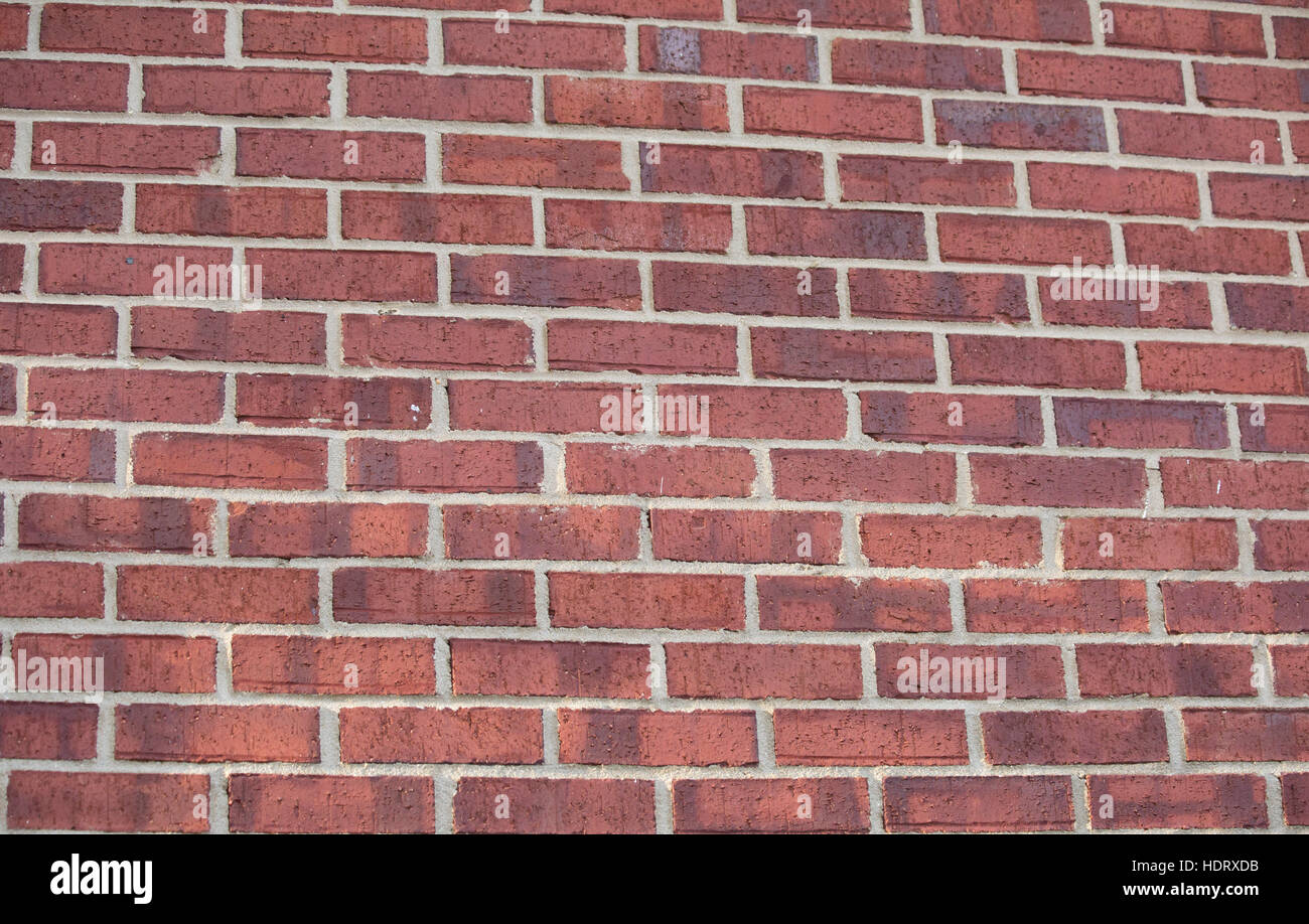 Red brick wall composed of small bricks Stock Photo - Alamy