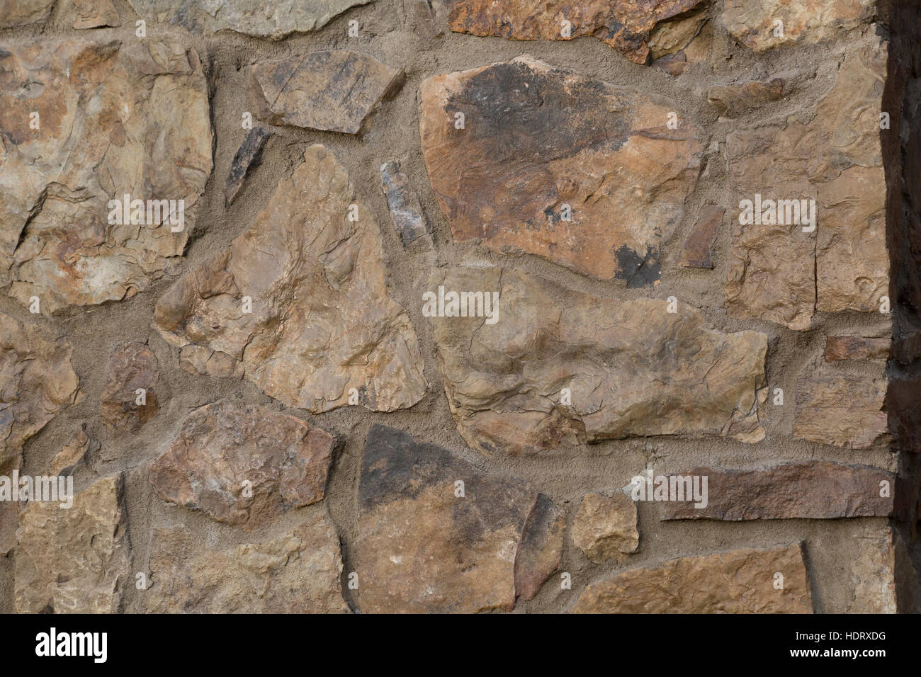Stone wall composed of large white stone Stock Photo - Alamy
