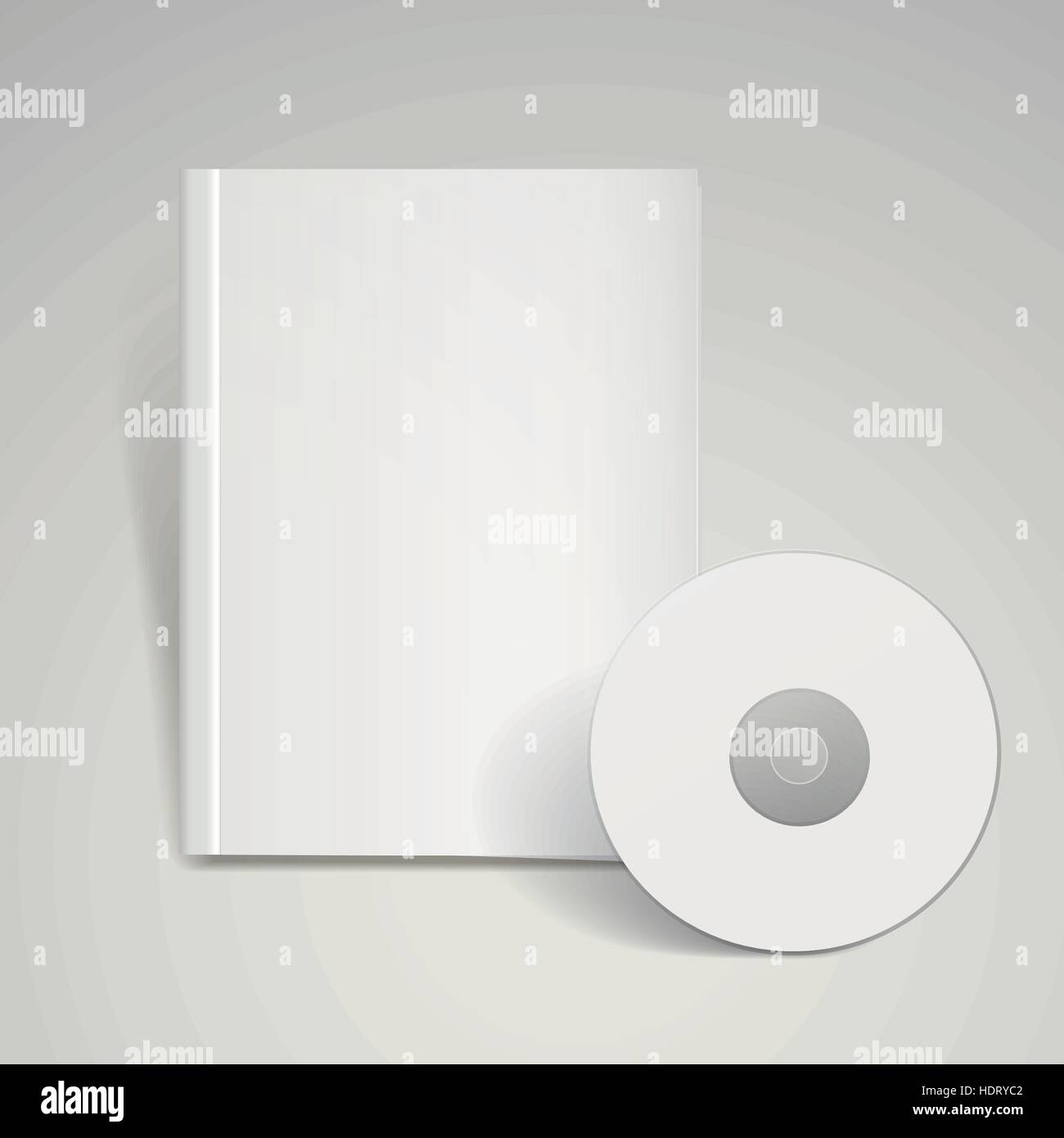 blank book or magazine with compact disc over grey background Stock ...