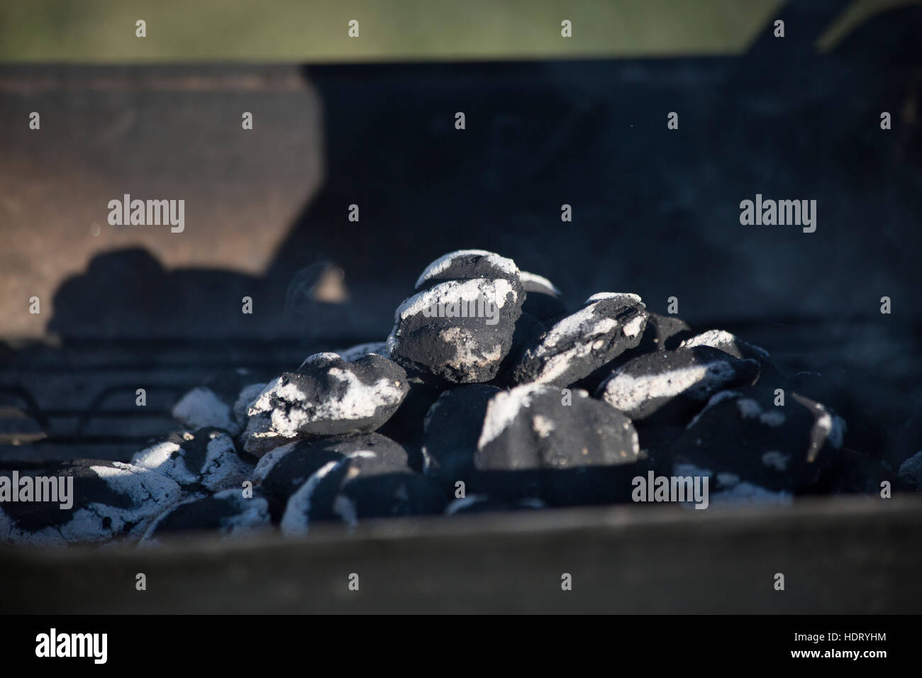 Smoking charcoal with small flame Stock Photo - Alamy