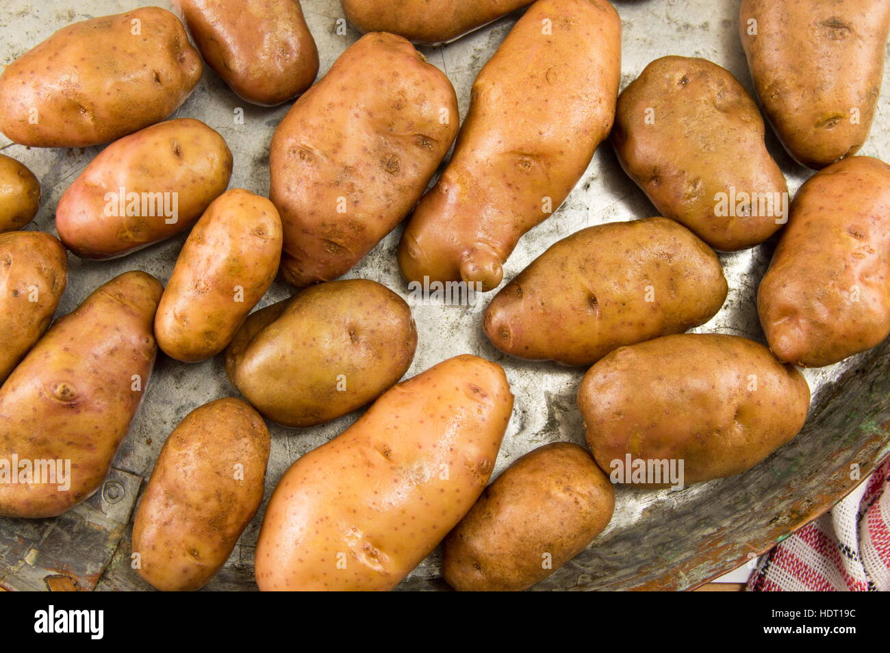 washed small and uncooked potatoes in a pan Stock Photo - Alamy