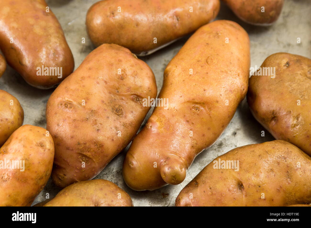 washed small and uncooked potatoes close up Stock Photo - Alamy