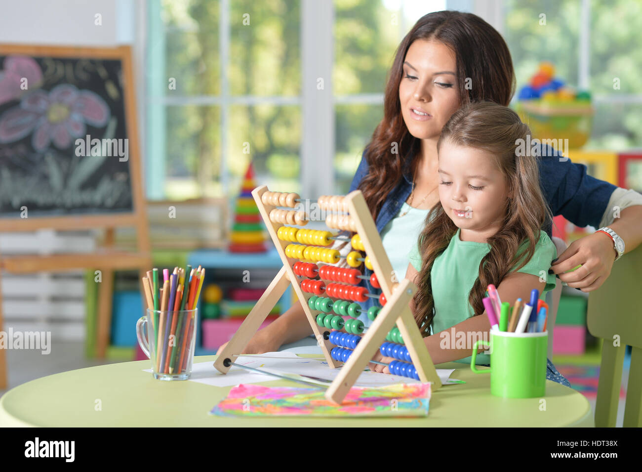 girl doing math exercises Stock Photo - Alamy
