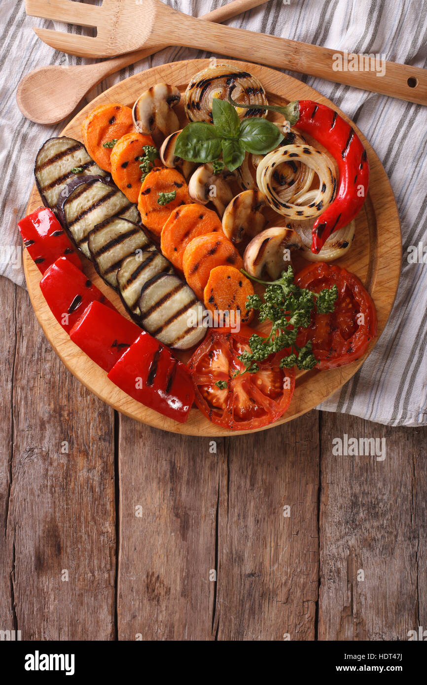 Grilled vegetables on a chopping board. vertical top view Stock Photo ...
