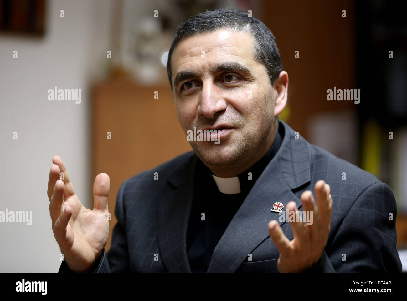 Father Paul Karam, president of Caritas Lebanon, in his office in ...