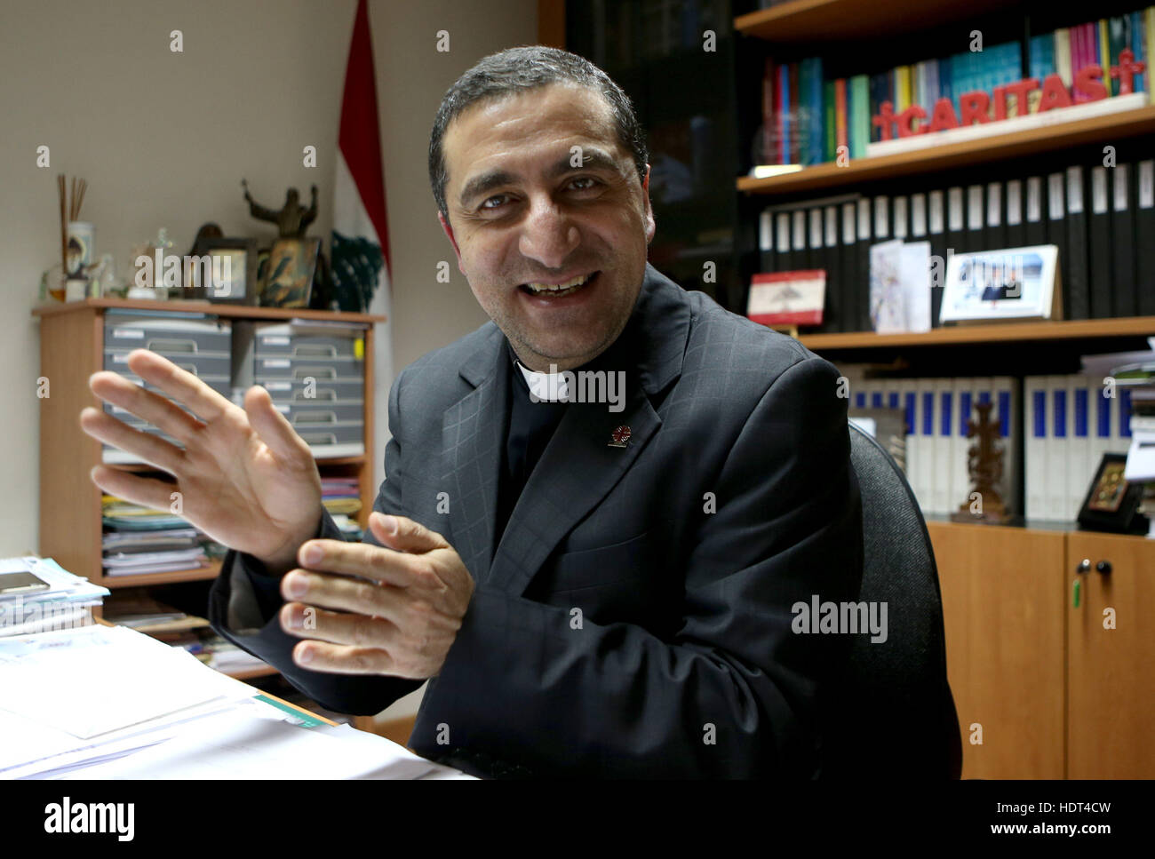 Father Paul Karam, president of Caritas Lebanon, in his office in ...