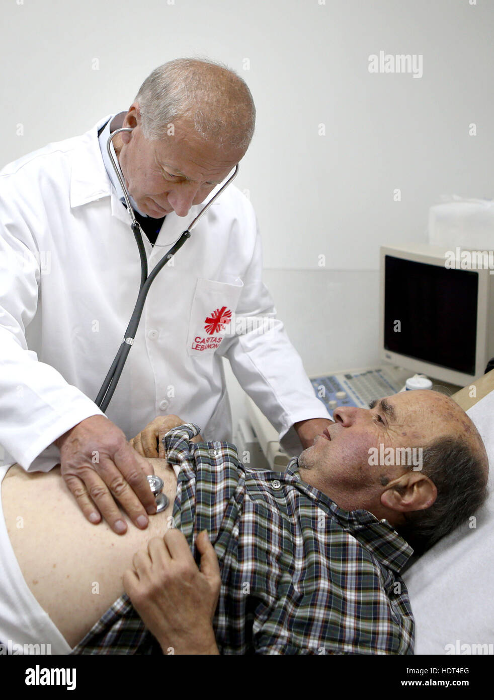 Dr Gabriel Haddad examines Jean Antoine Sfeir, a Lebanese man who has a ...