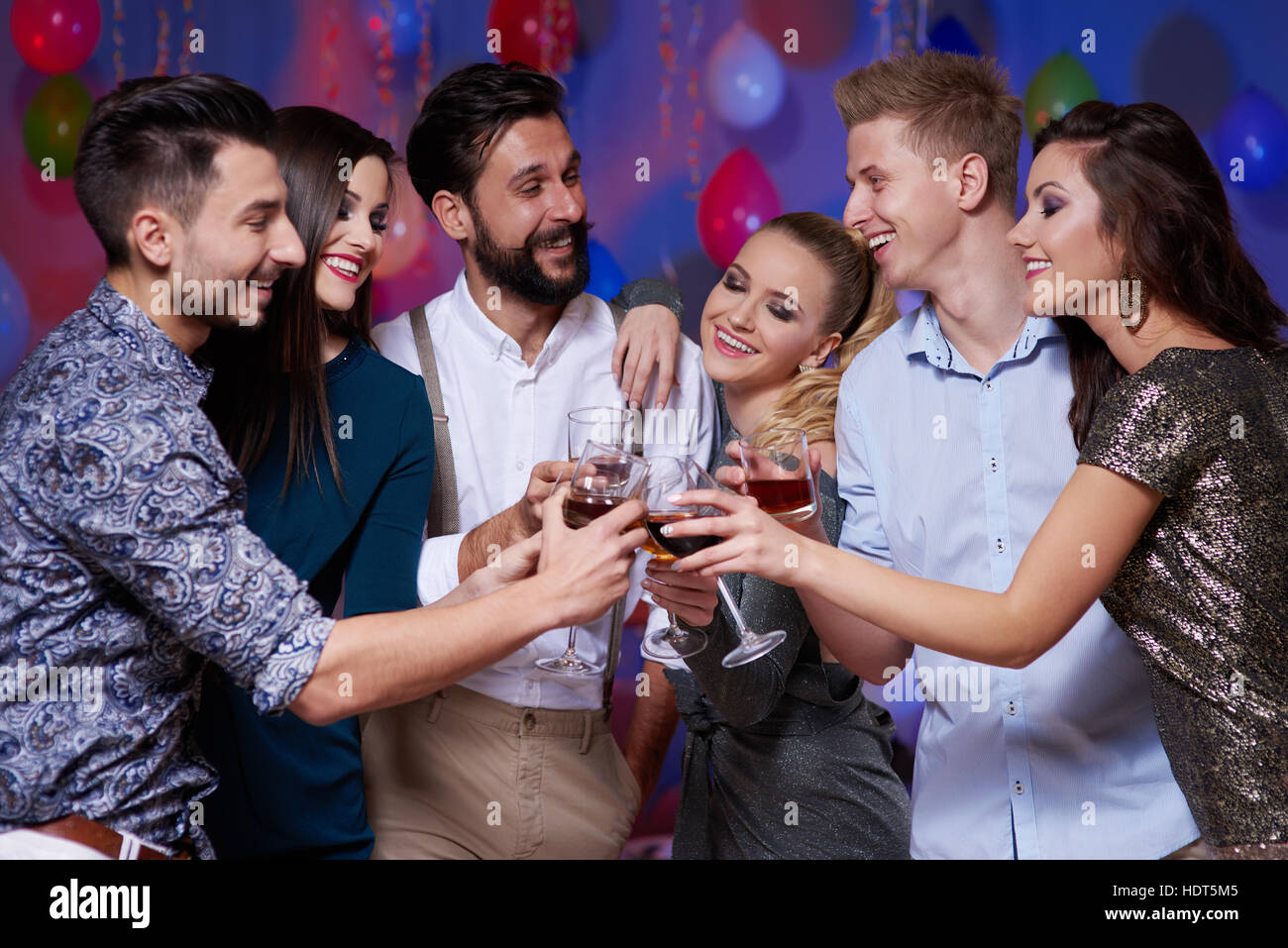 Cheers to the love of friendship hi-res stock photography and images ...
