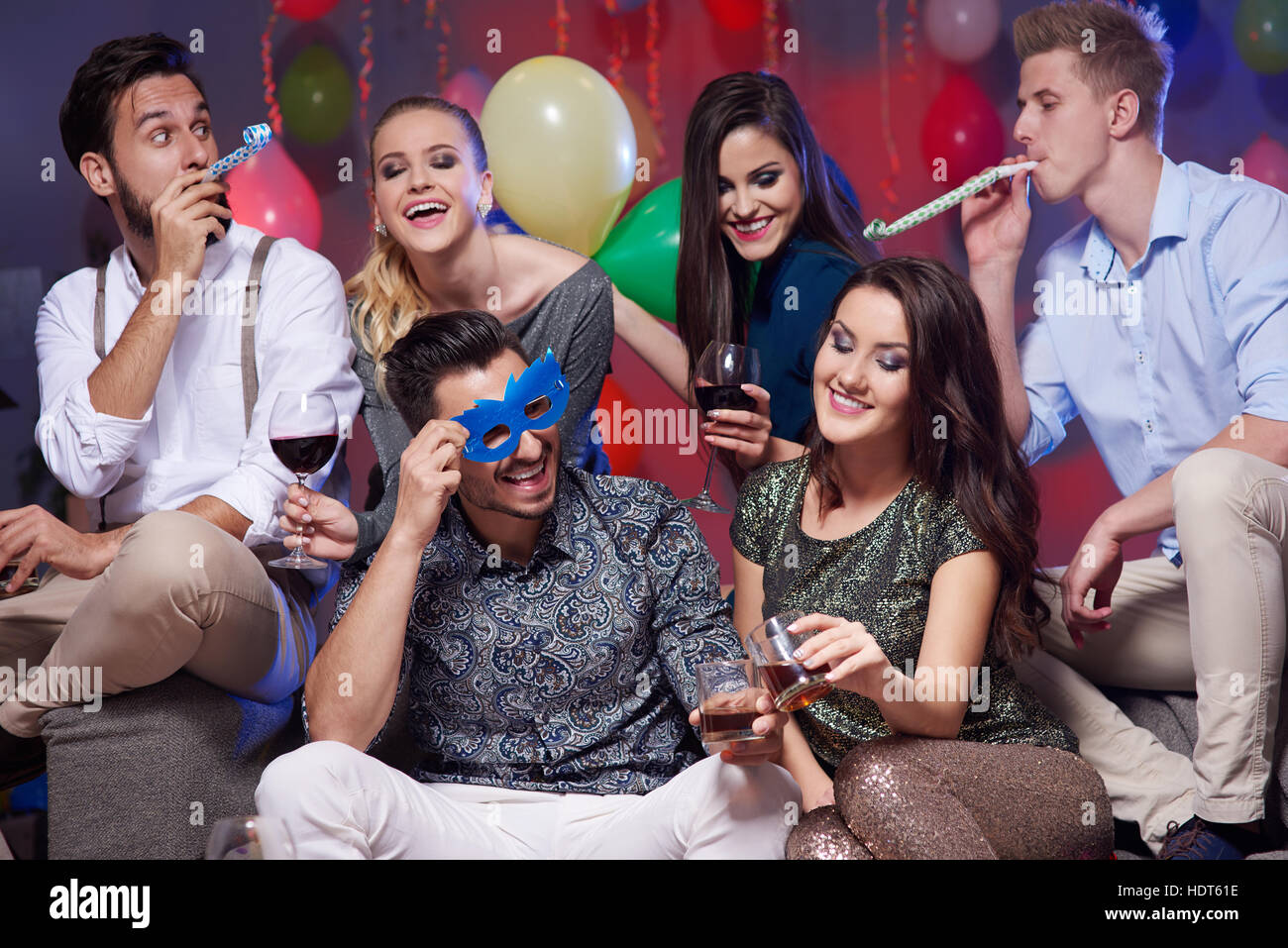 Young people making some noise at the party Stock Photo - Alamy