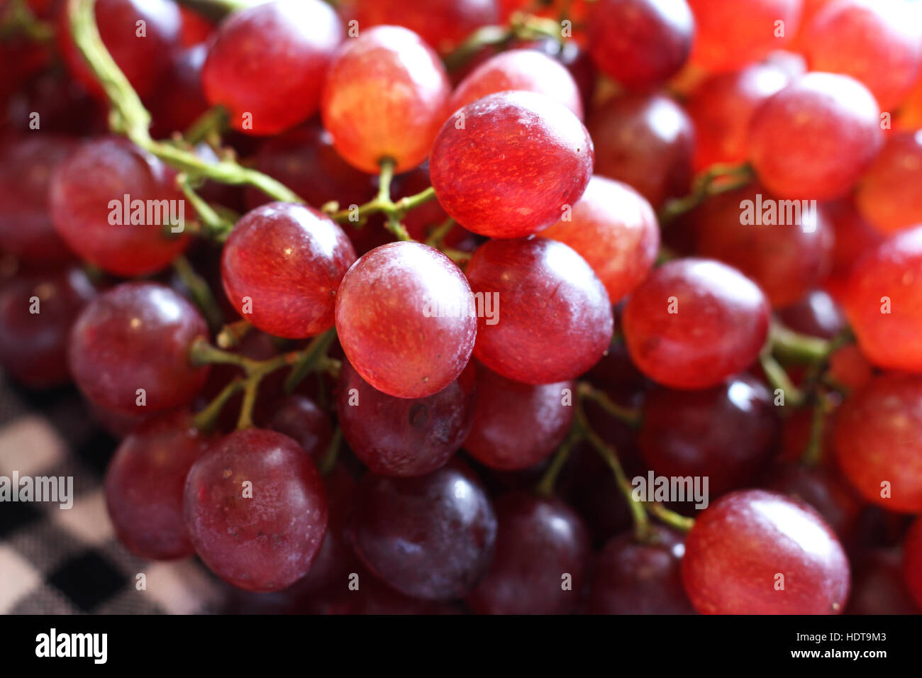 Sweet red grapes Stock Photo - Alamy