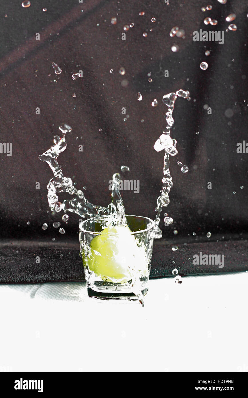 Jujube fruits water splash Stock Photo - Alamy